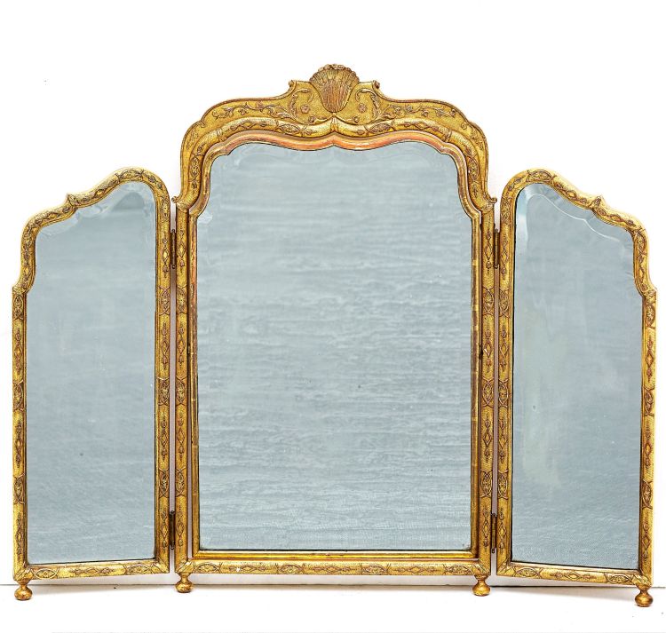 A George I style carved gilt gesso three-fold mirror | Strauss & Co