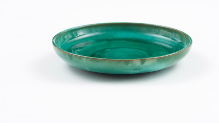 A Linn Ware green-glazed dish | Strauss & Co