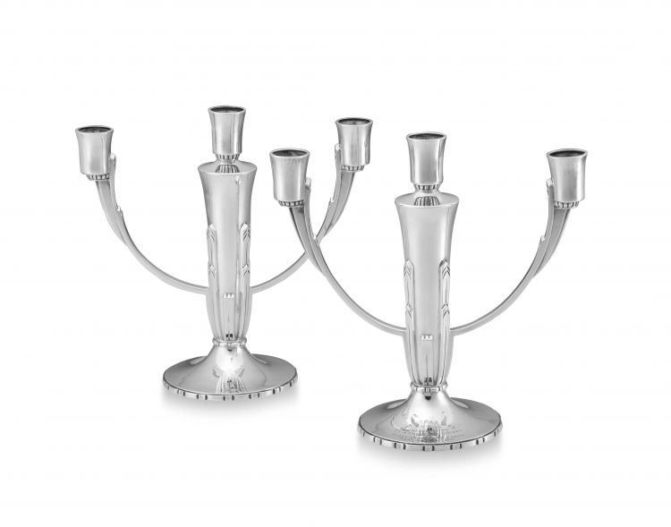 A pair of George VI silver three-light candlesticks, Robert Edgar Stone ...