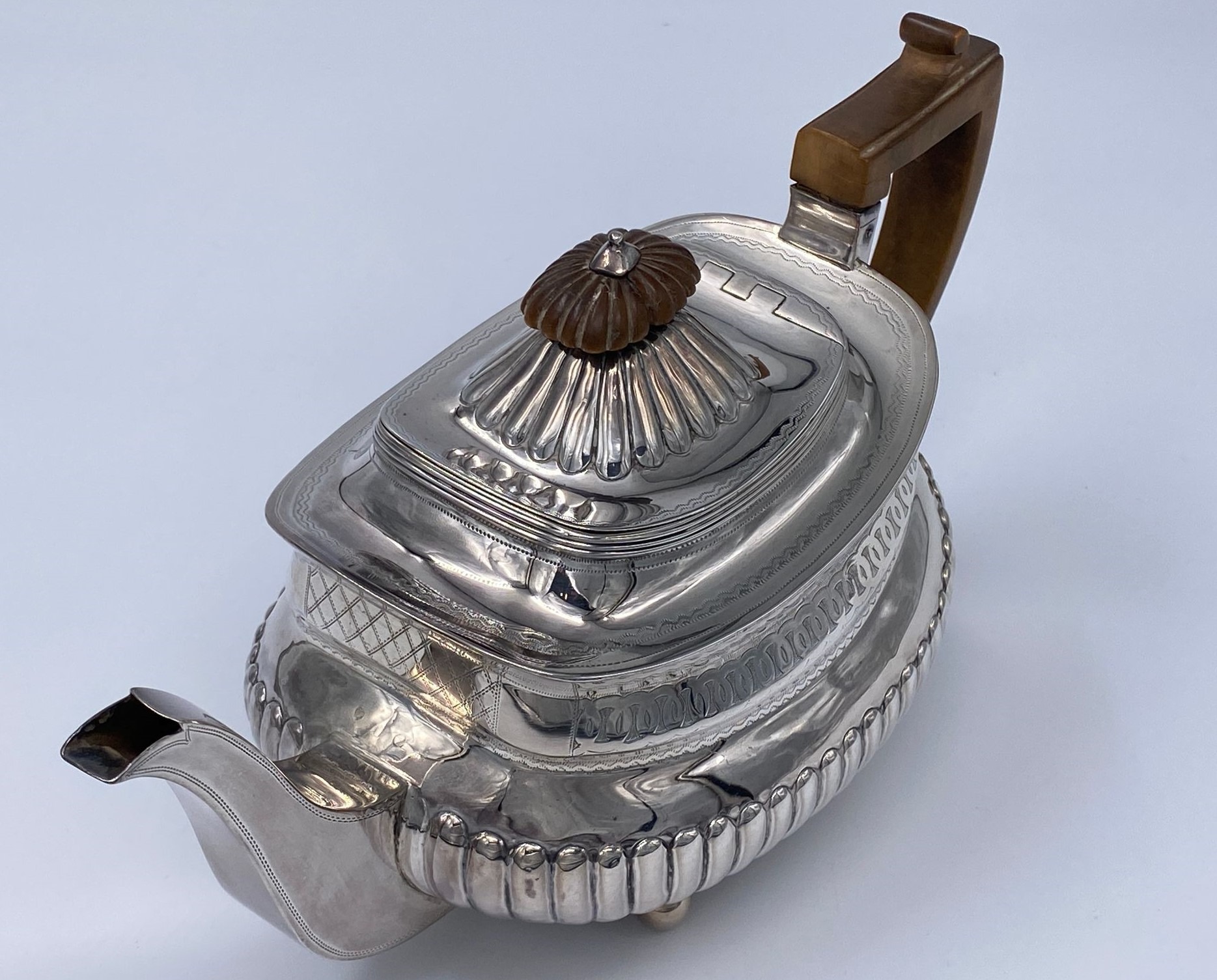 A George III silver teapot, James Tookey, London, 1805 | Strauss & Co