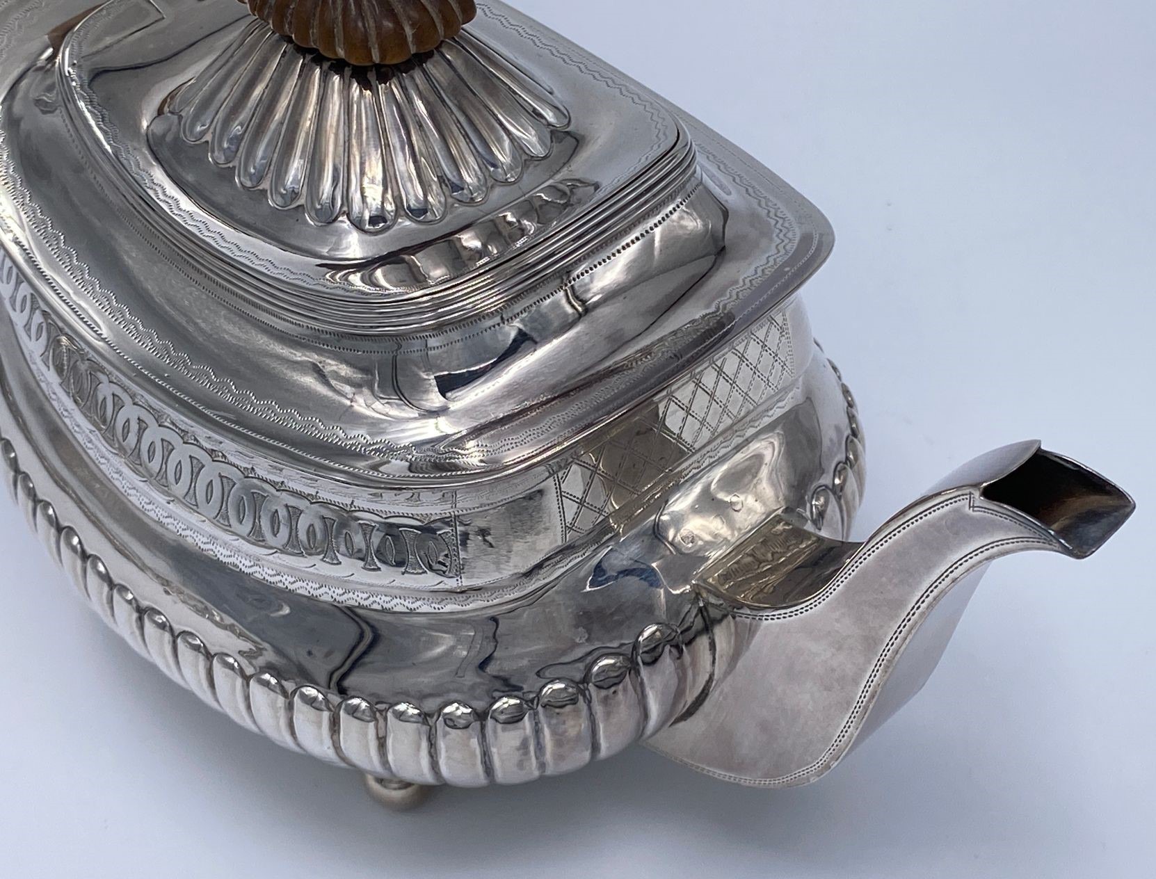 A George III silver teapot, James Tookey, London, 1805 | Strauss & Co