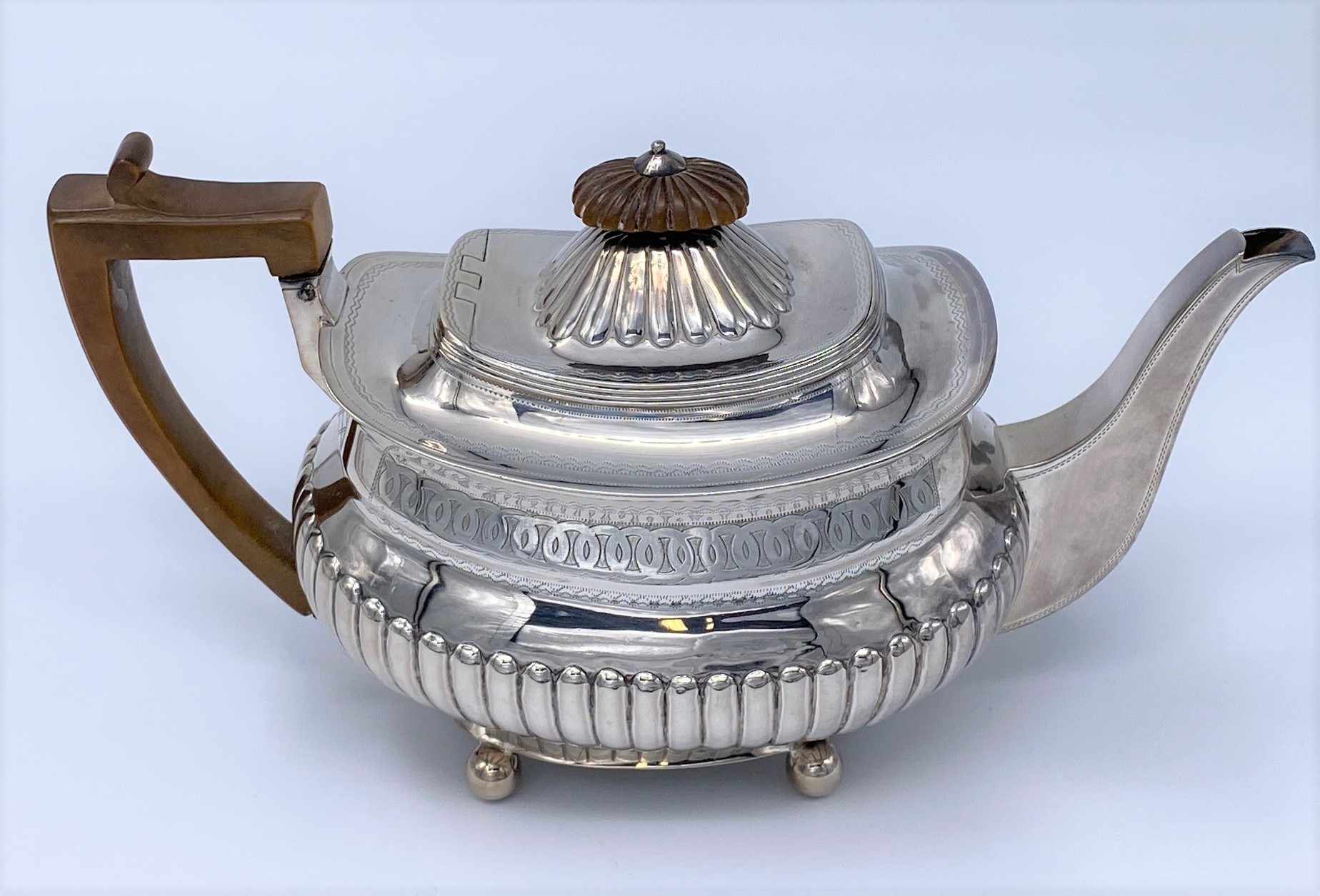 A George III silver teapot, James Tookey, London, 1805 | Strauss & Co